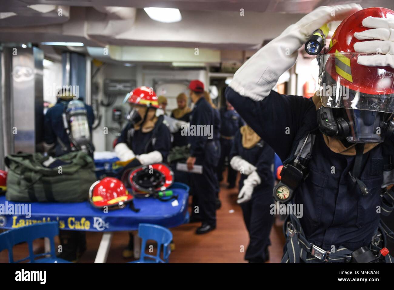 171010-N-FP878-037 ATLANTIC OCEAN (Oct. 10, 2017) Sailors don ...