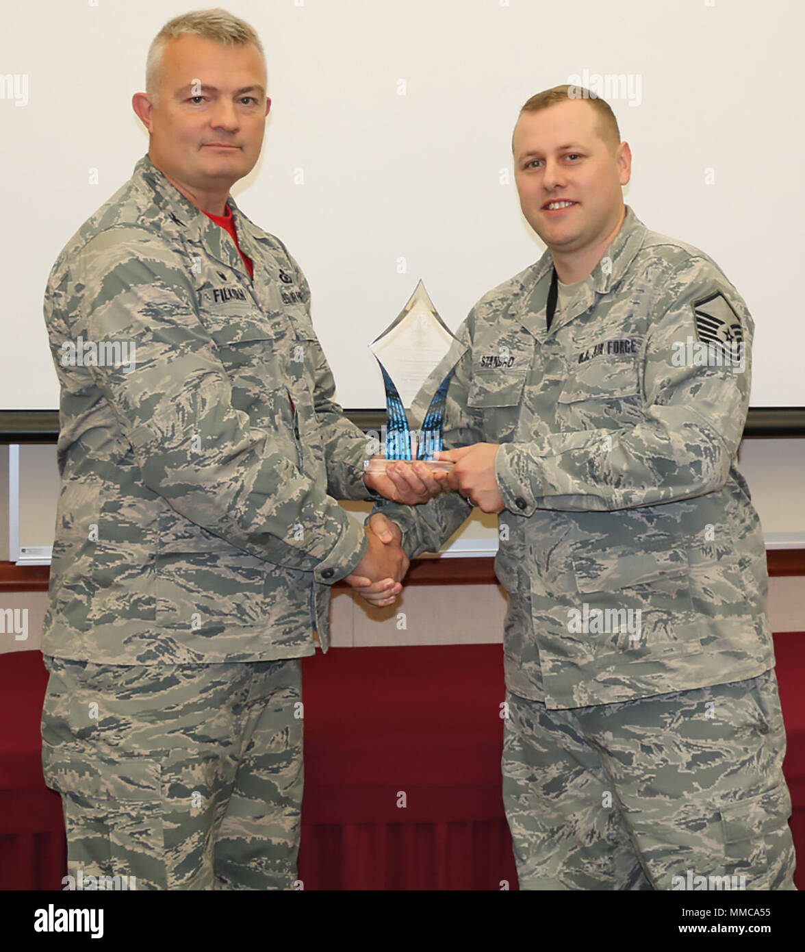 Col. Emil Filkorn, Commander, Eastern Air Defense Sector, presents an ...