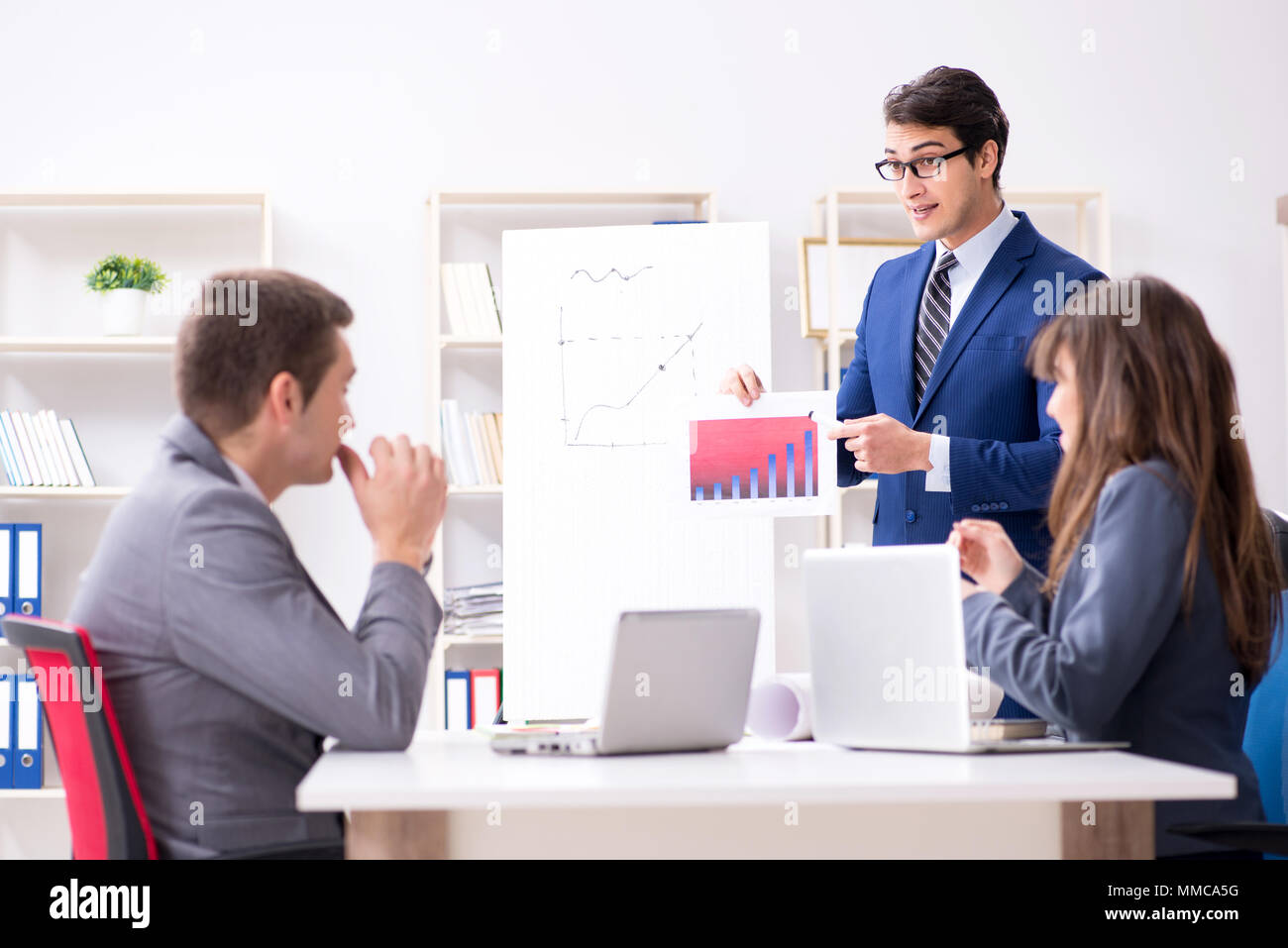 Business meeting with employees in the office Stock Photo - Alamy