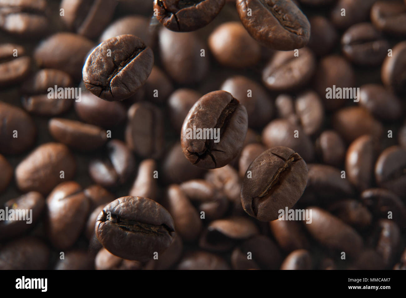 Closeup coffee beans falling hi-res stock photography and images - Alamy