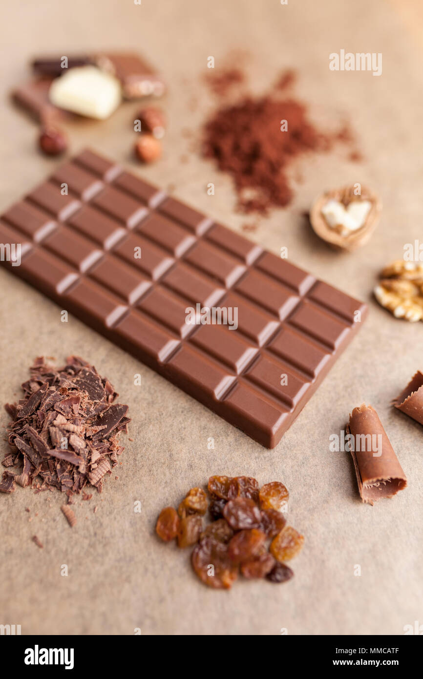 Delicious sweet chocolate bar and ingredients Stock Photo - Alamy