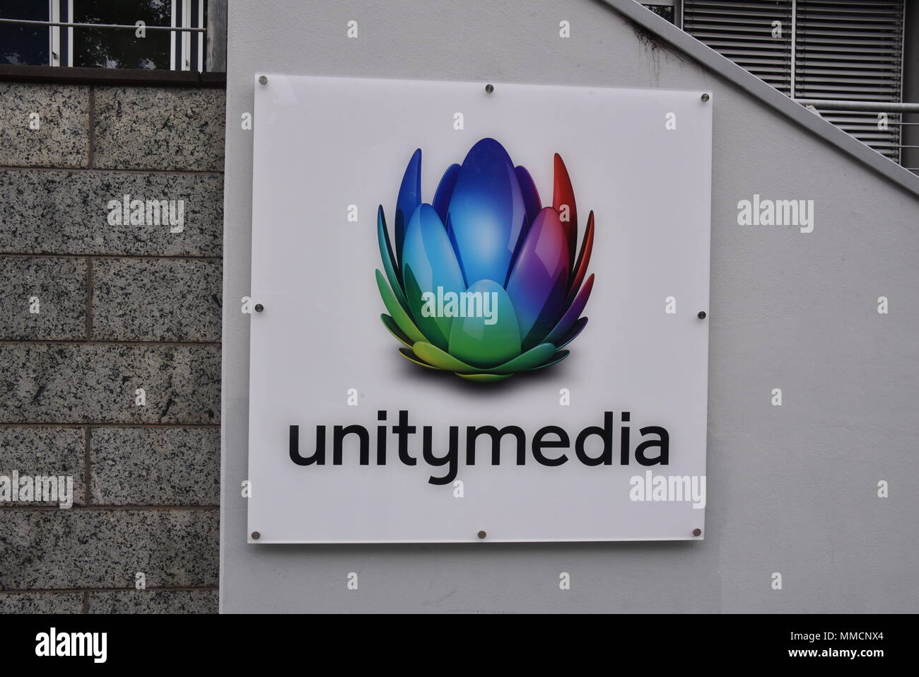 10 May 2018, Germany, Cologne: The logo of cable company Unitymedia, a ...