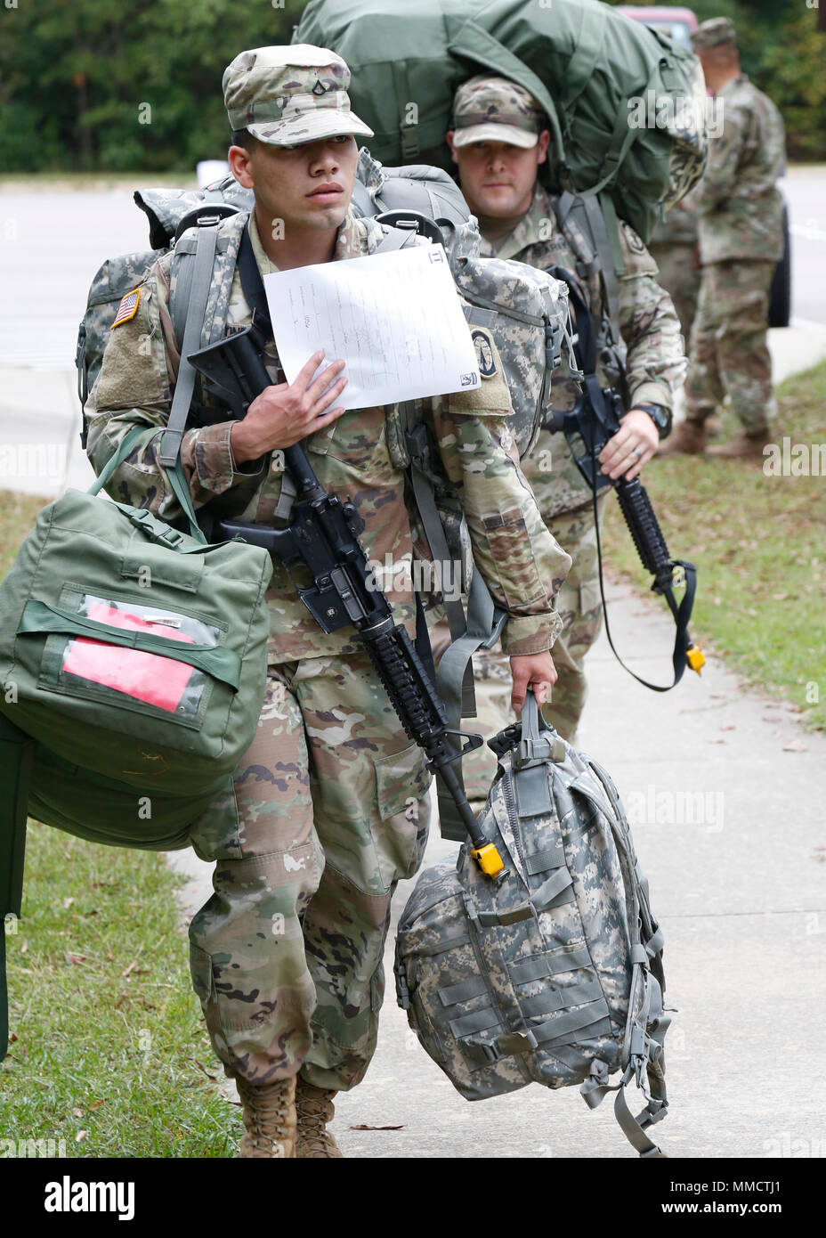 Candidates go through the first day of the Expert Field Medical Badge ...