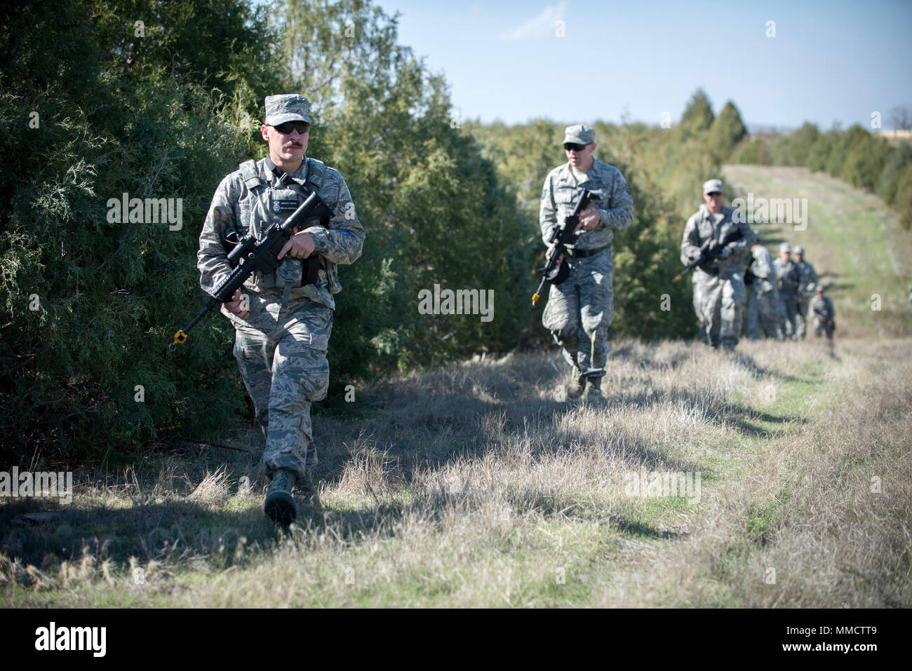 U.S. Air Force Senior Airman Dustin Jirovsky (left), 140th Security ...