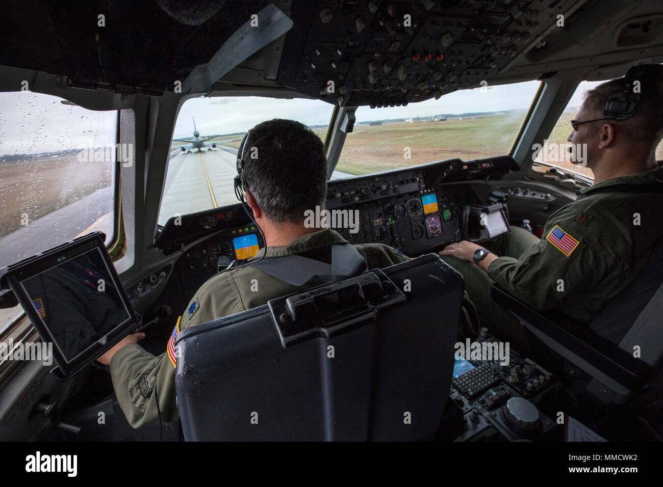 U.S. Air Force KC-10 Extender Pilots Lt. Col. Jarett J. Mazza, left ...