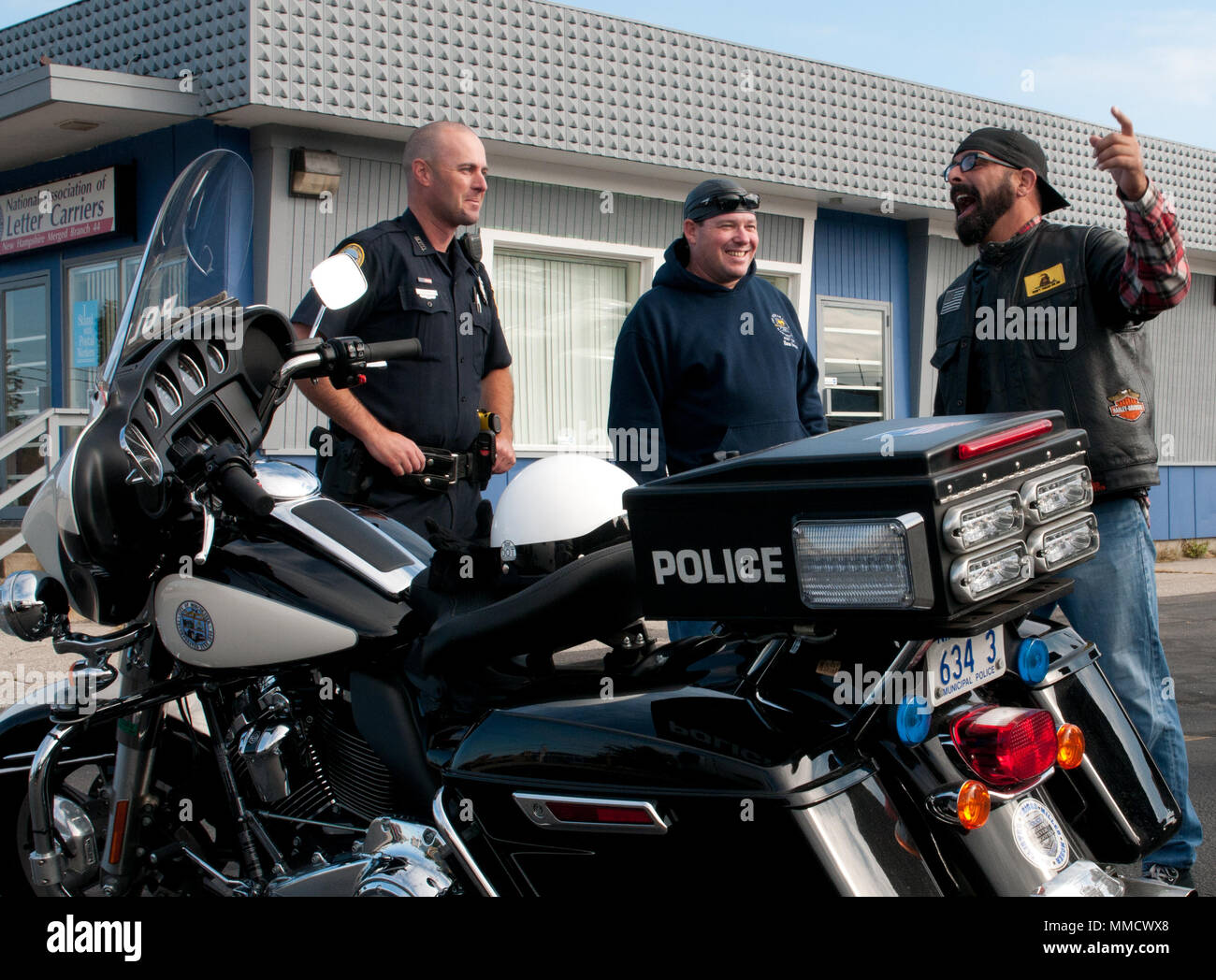 Patrick Skerry, a police escort and officer with the Manchester Police ...