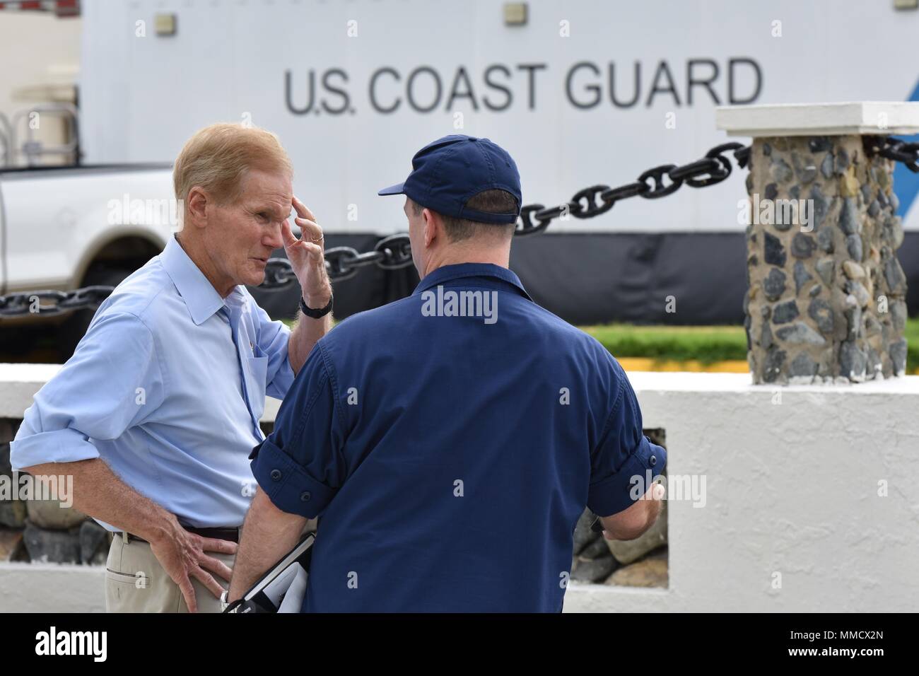 Sen. Bill Nelson speaks with Capt. Eric King, Coast Guard Hurricane ...