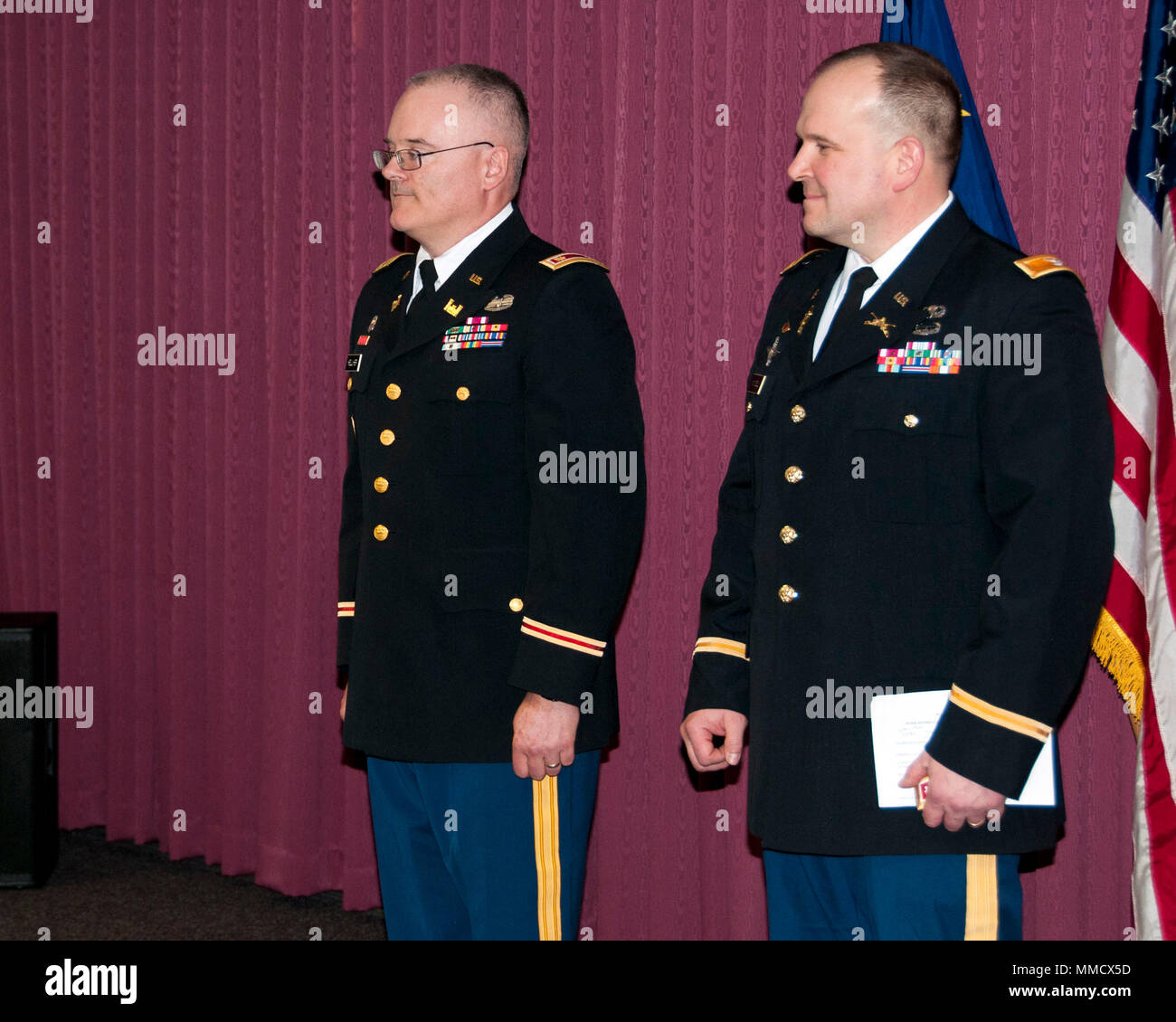 Lt. Col. Mark Kelliher (left), operations officer assigned to the 297th ...