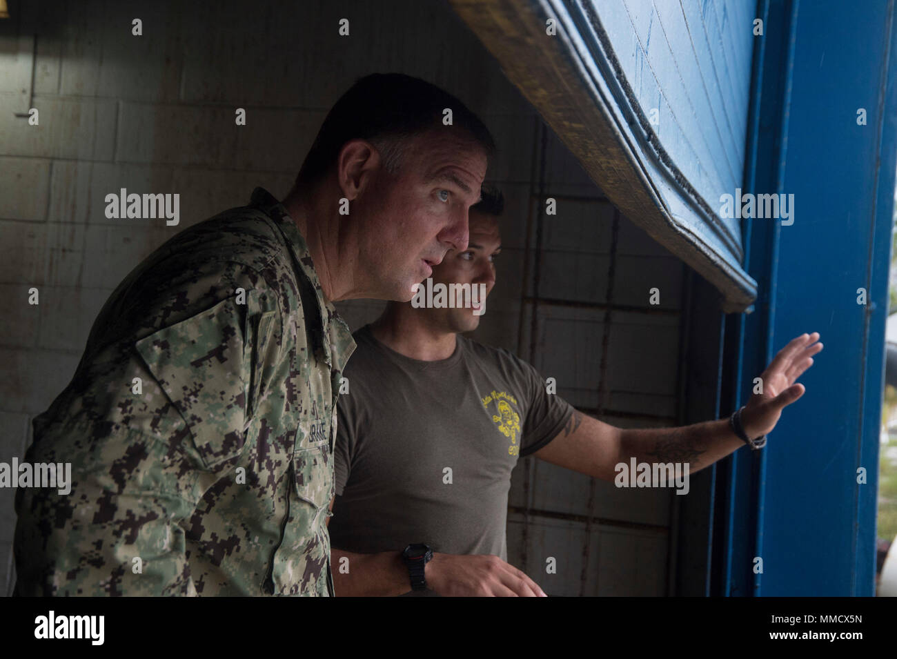 U.S. Navy Rear Adm. Brian Brakke, commander, Navy Expeditionary Combat ...