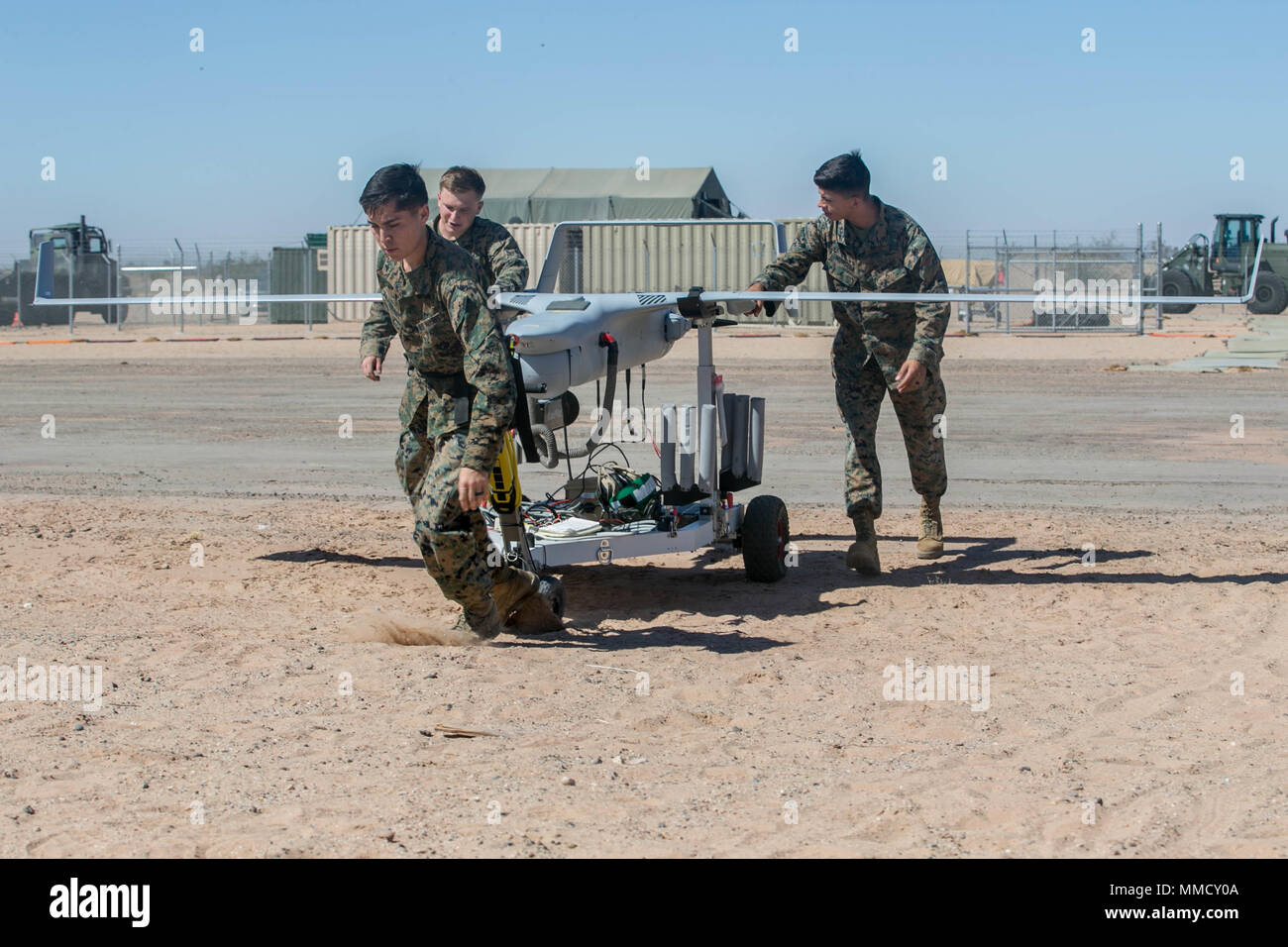 U.S. Marines with Marine Unmanned Aerial Vehicle Squadron One prepare ...