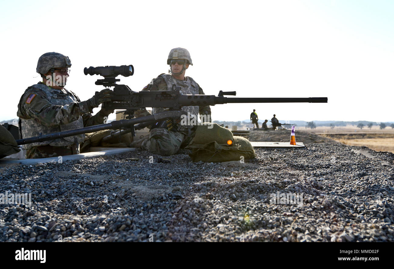 U.S. Army Reserve Spc. Stephen Justin adjusts an AN/PAS-13 Thermal ...