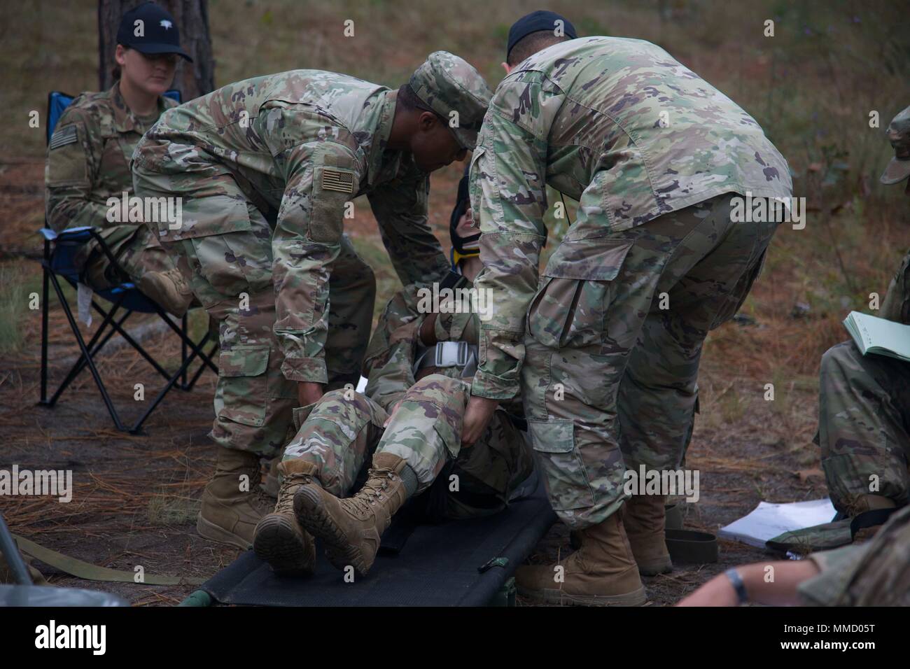 U.S Army Soldiers practice assessing a casualty for the Expert Field ...