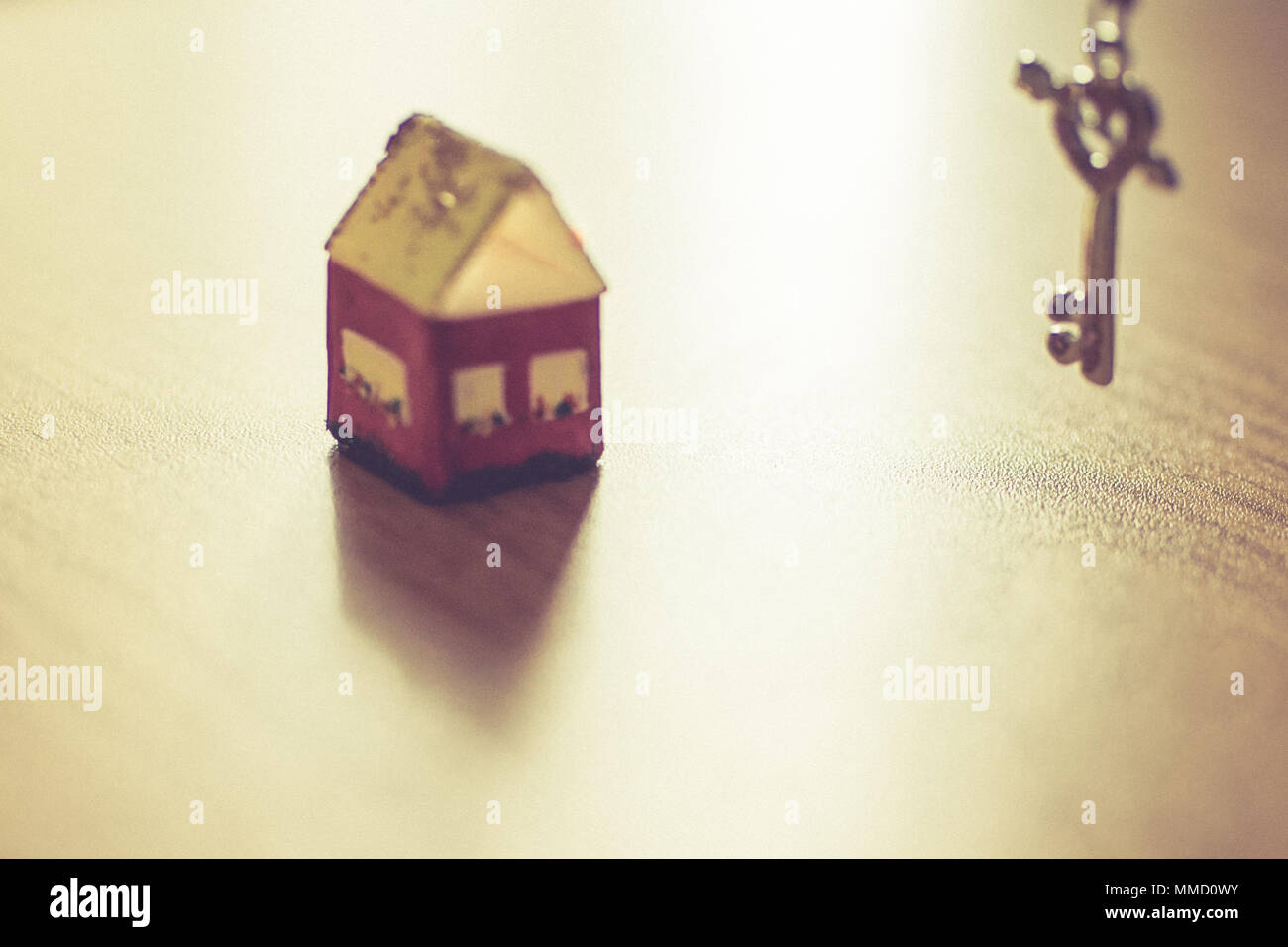 Small house and key Stock Photo - Alamy
