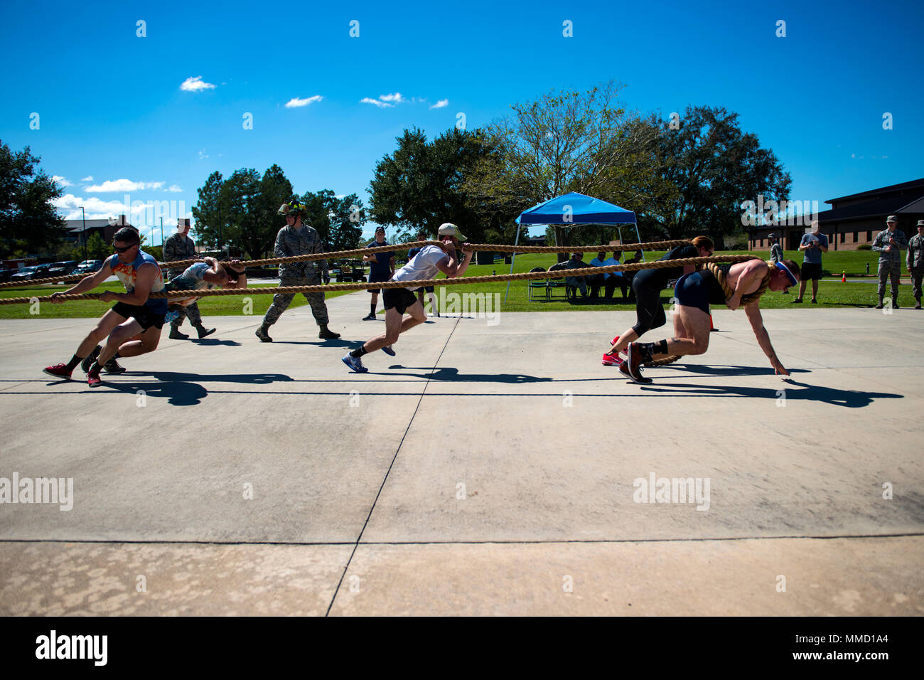 Airmen assigned to the 23d Civil Engineer Squadron pull a firetruck ...