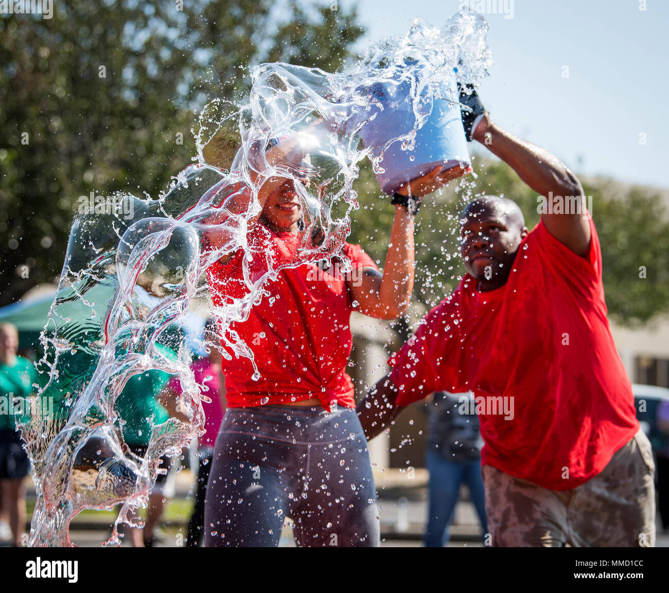 Rolling up fire hose hi-res stock photography and images - Alamy