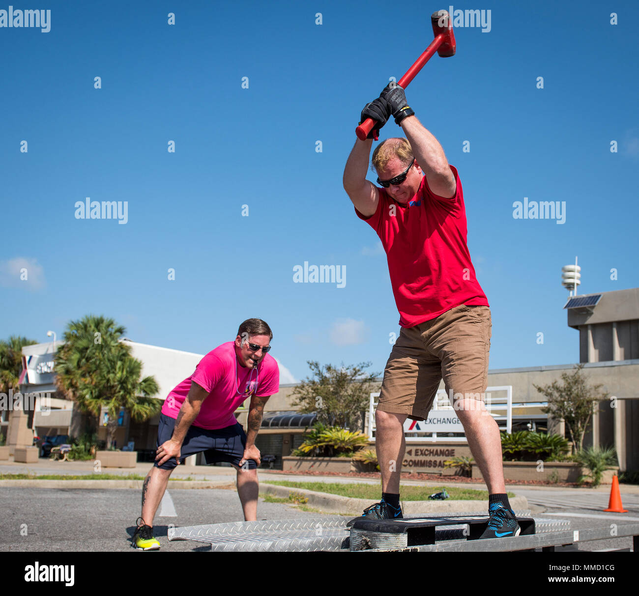 Rolling up fire hose hi-res stock photography and images - Alamy