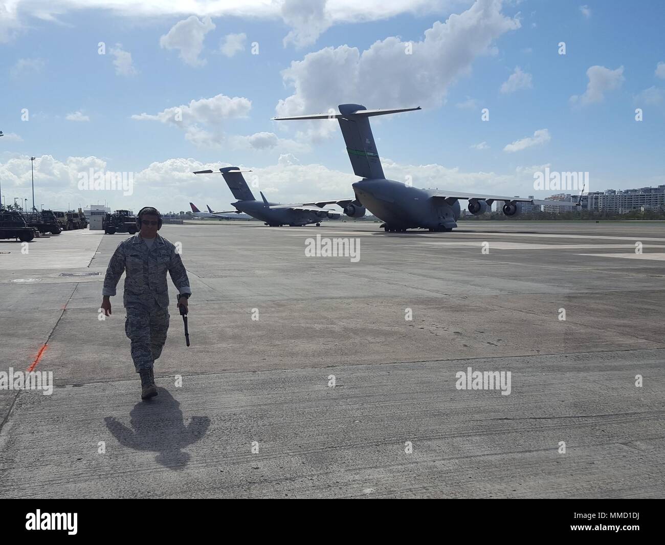 Master Sgt. Alan Romero, an airfield manager for the 167th Airlift Wing ...