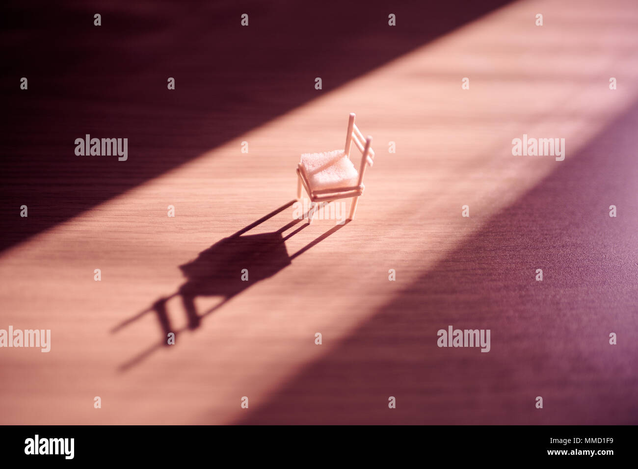 chair in dark room with light way Stock Photo - Alamy
