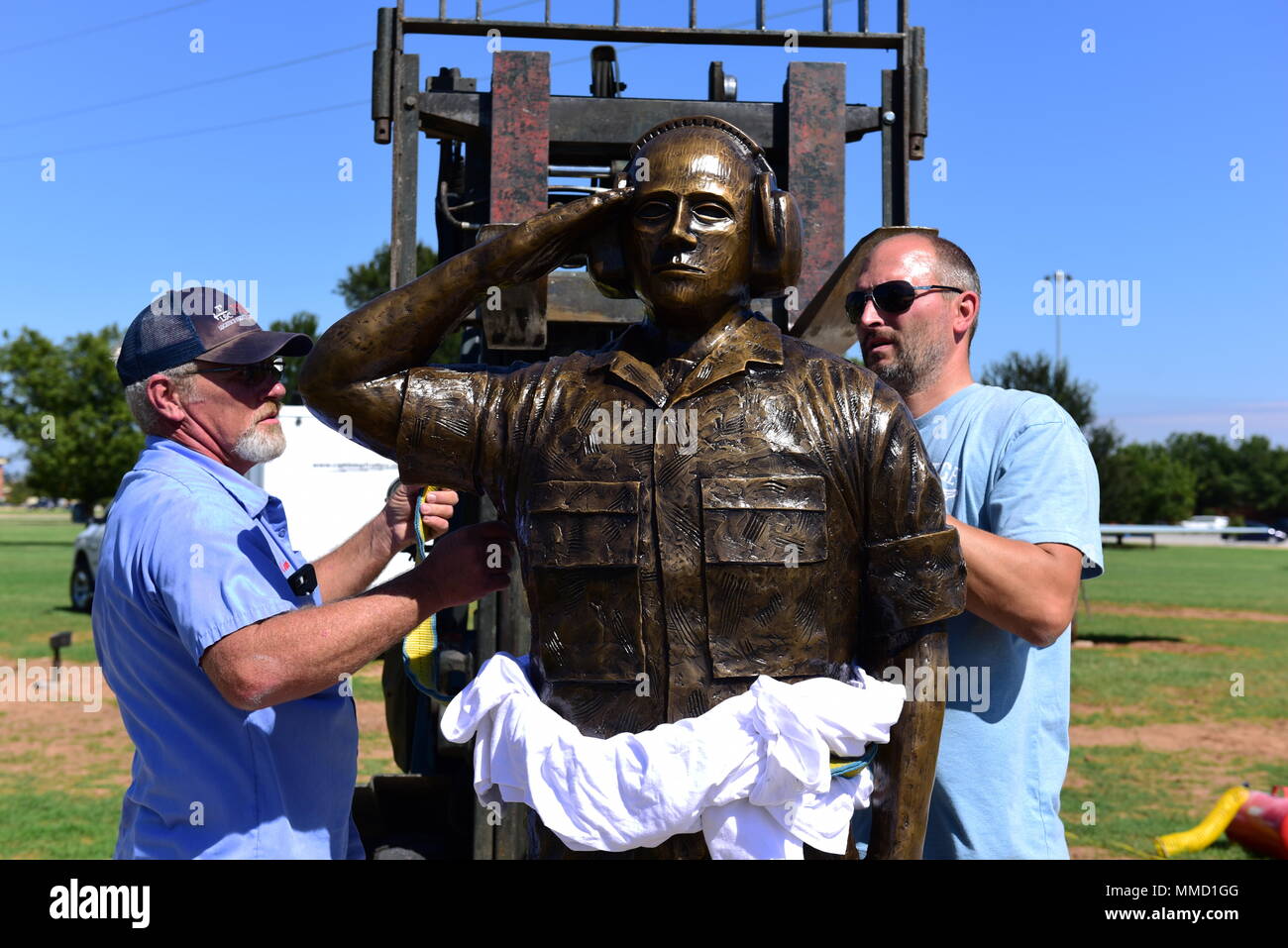 Sheppard installs maintenance man statue Stock Photo - Alamy