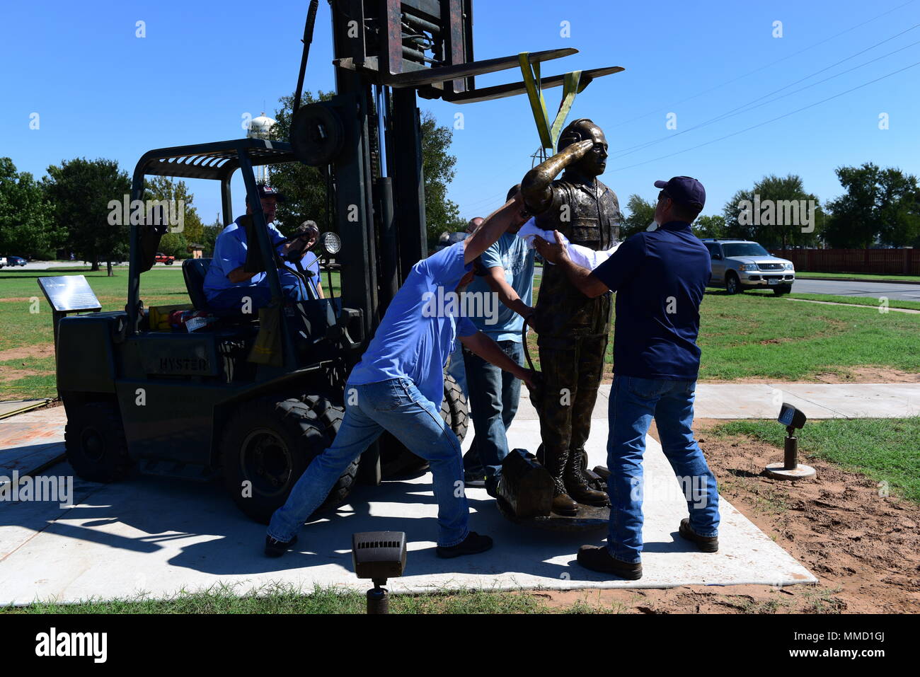 Sheppard installs maintenance man statue Stock Photo - Alamy