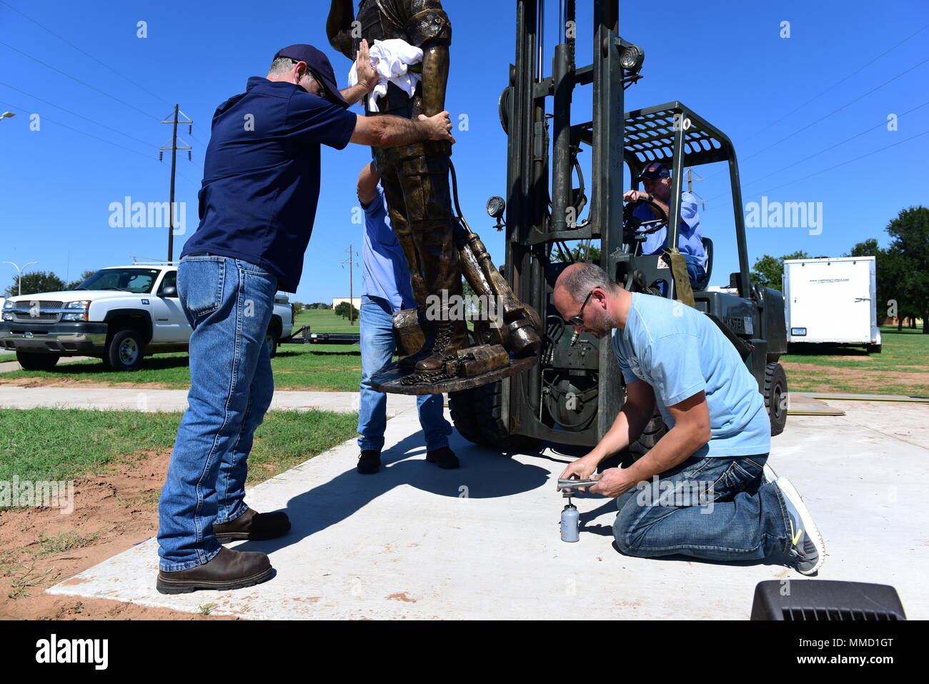 Sheppard installs maintenance man statue Stock Photo - Alamy