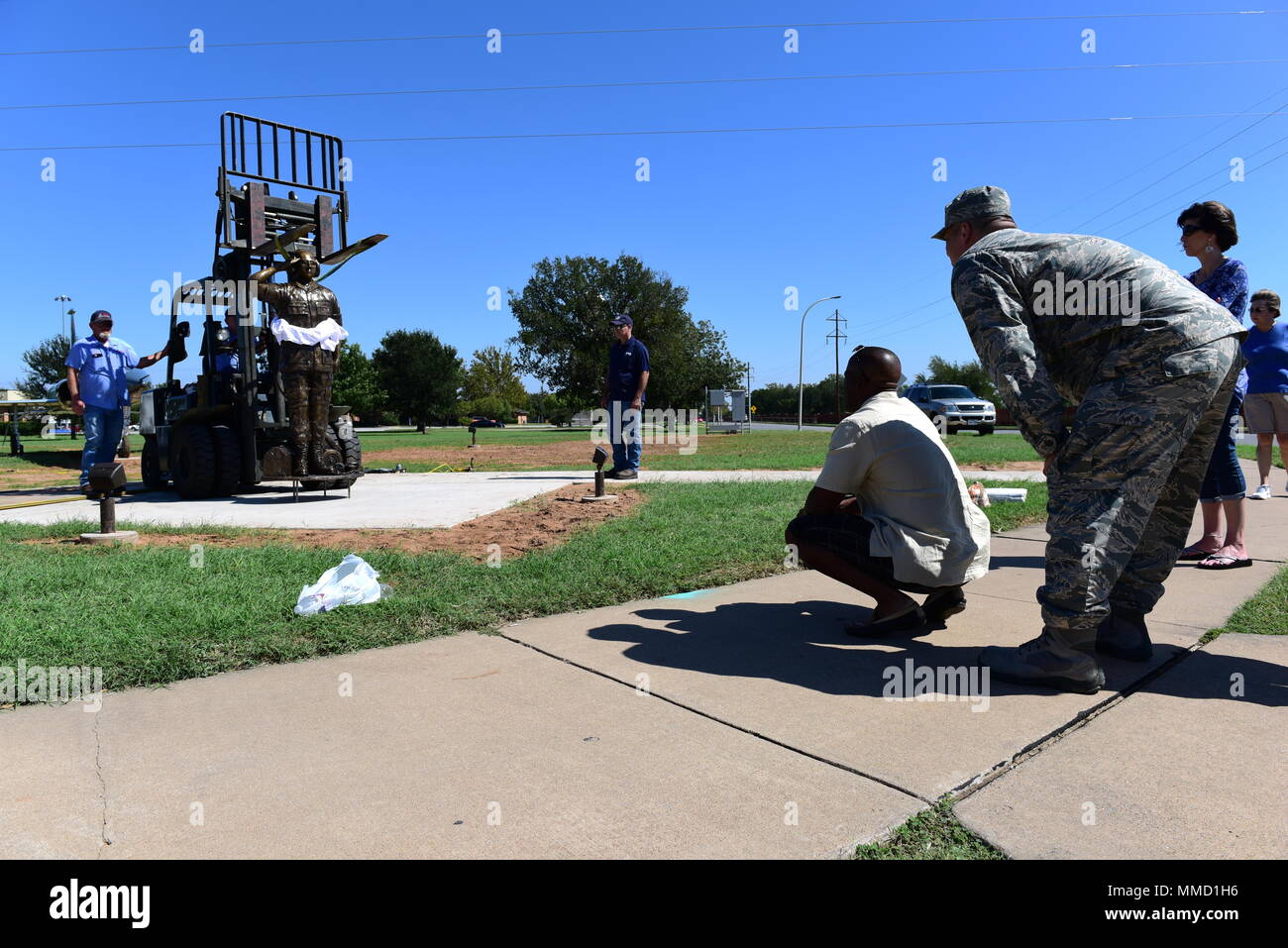Sheppard installs maintenance man statue Stock Photo - Alamy
