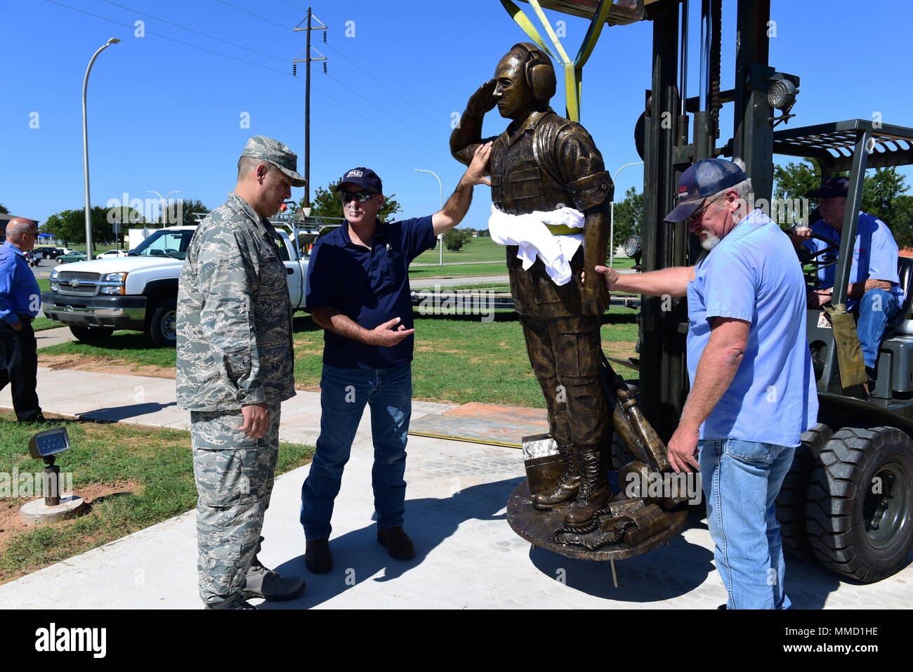 Sheppard installs maintenance man statue Stock Photo - Alamy