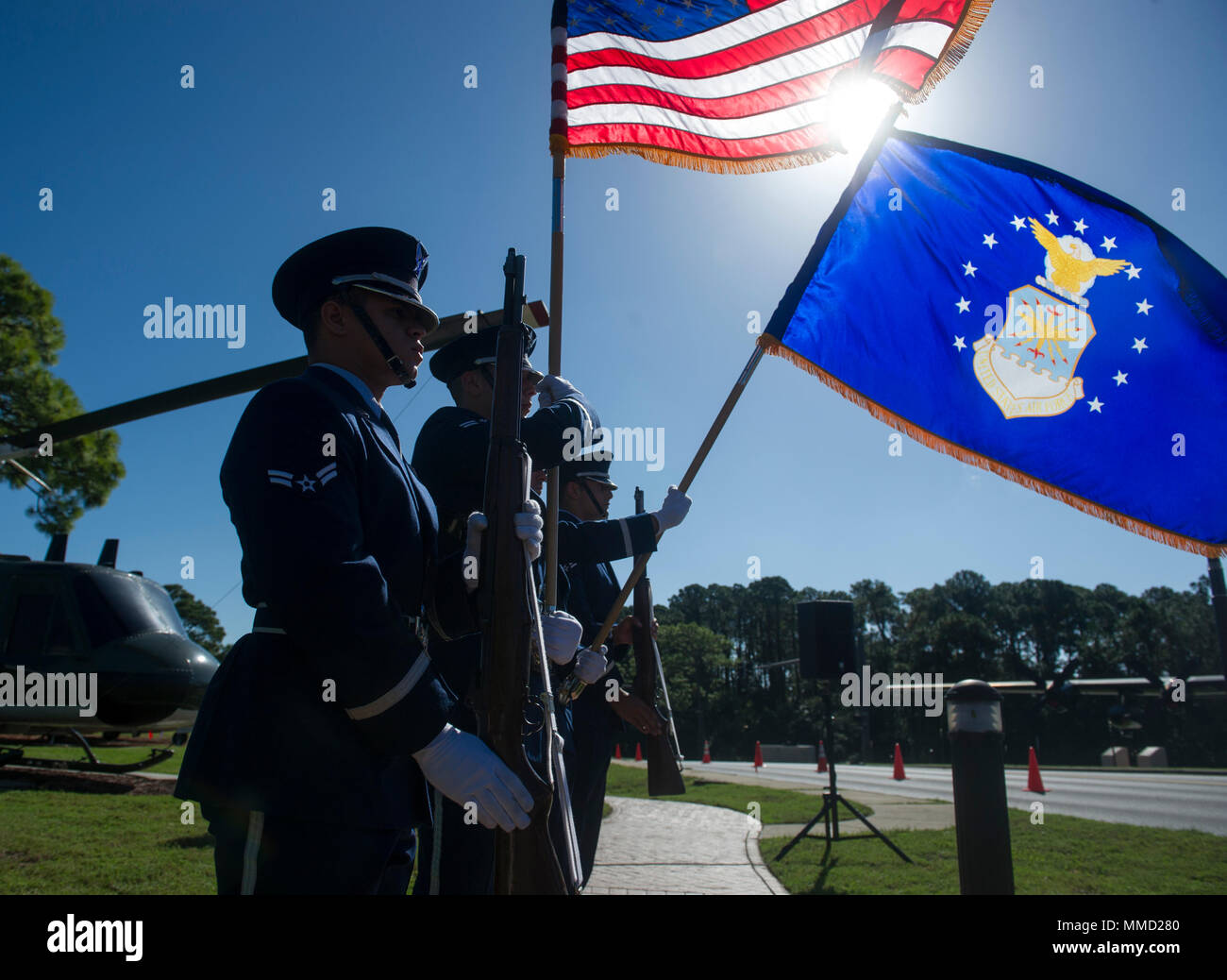 Members of the Hurlburt Field Honor Guard present the colors at a ...