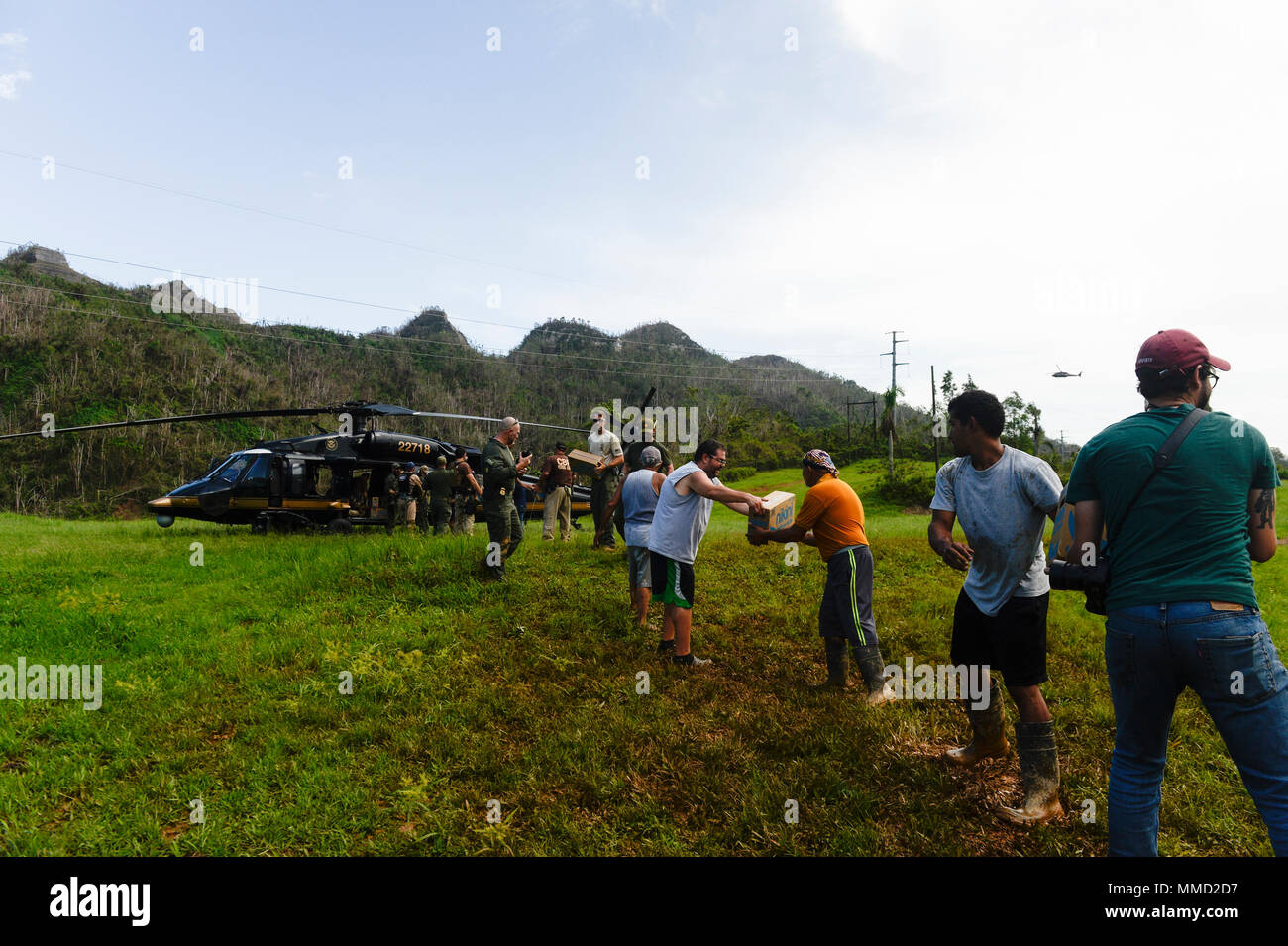 The U.S. Department of Homeland Security delivers food and water to ...