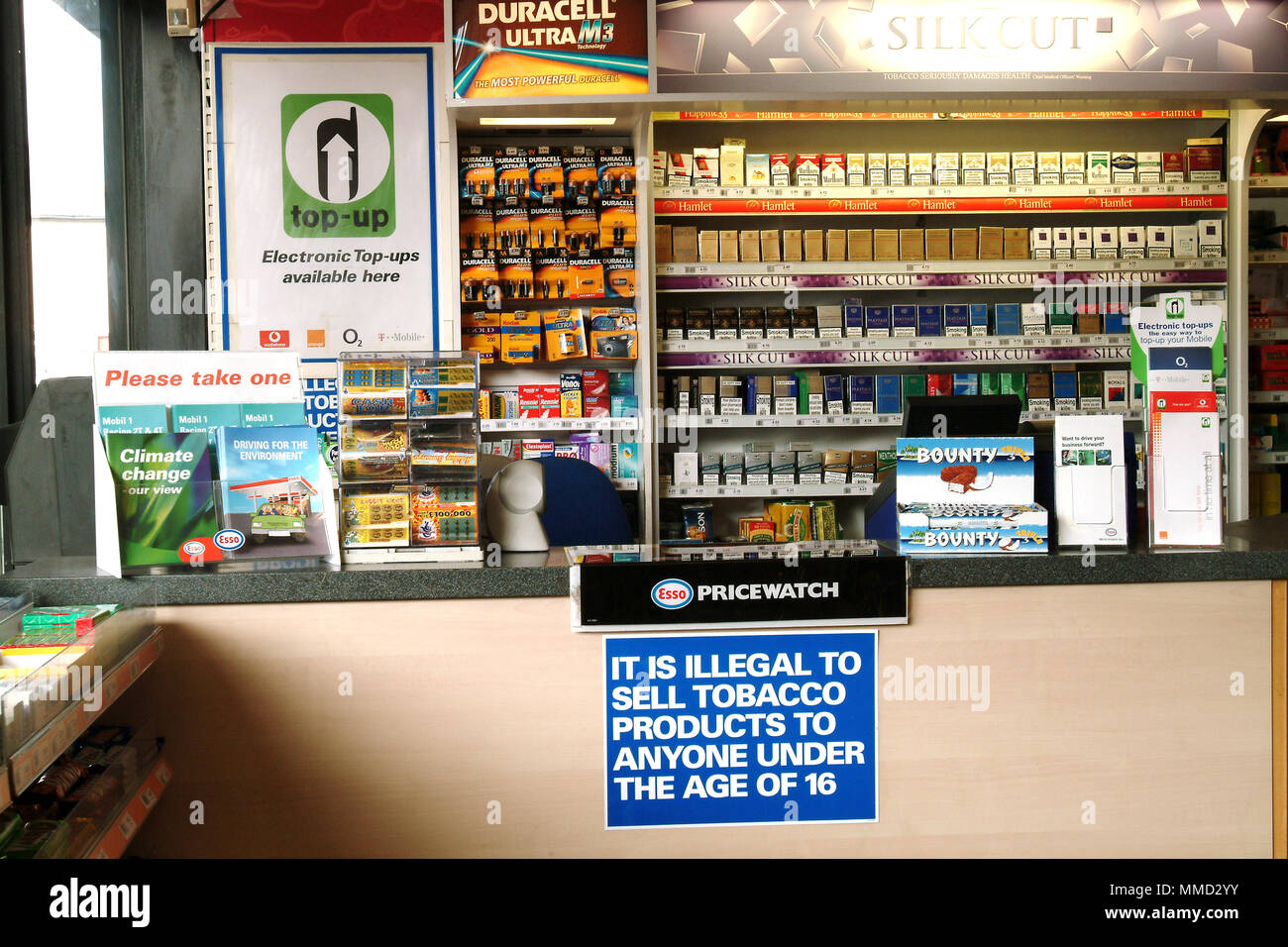 Tobacco counter with open shelves in petrol station Stock Photo - Alamy