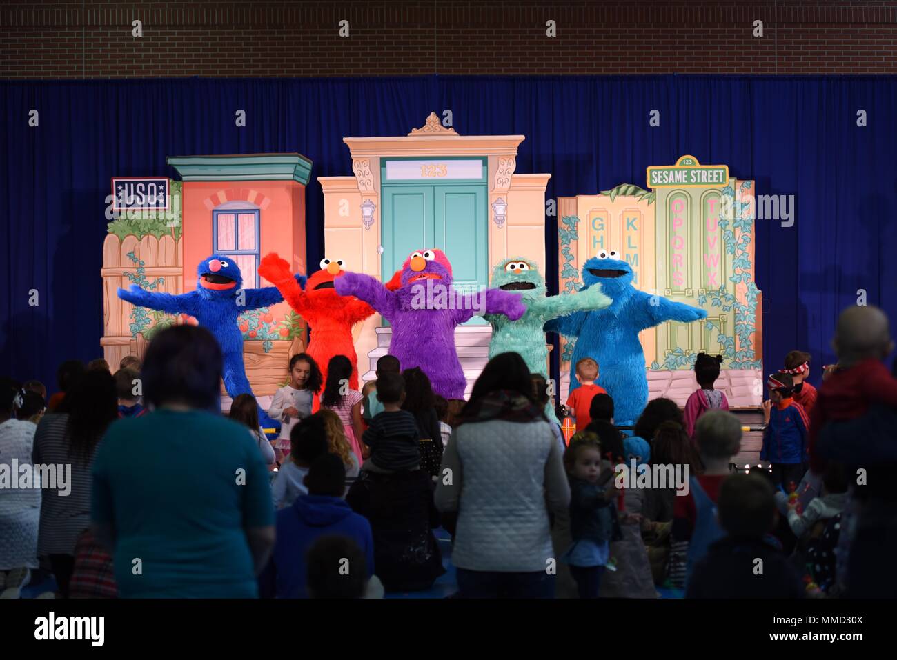Sesame Street characters sing a song to the audience at the USO’s ...