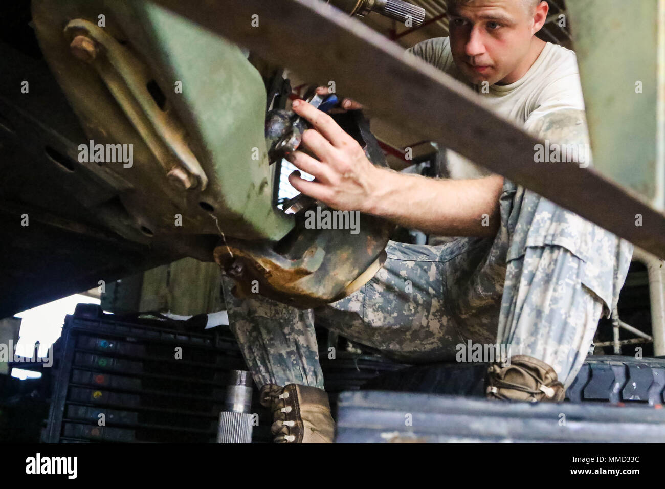 A wheeled vehicle mechanic Soldier with 1st Battalion, 1st Air Defense ...