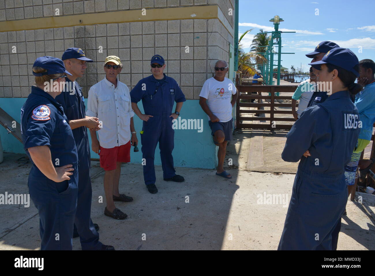 U.S. Coast Guard Cmdr. Kelly Thorkilson and Lt. Cmdr. Brett Workman ...