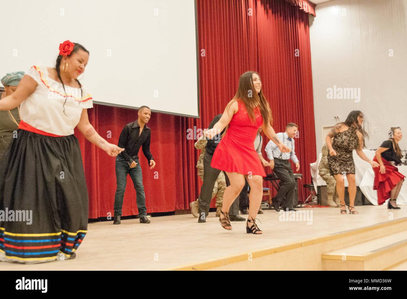 CAMP ARIFJAN, Kuwait — Soldiers perform a Hispanic line dance with ...