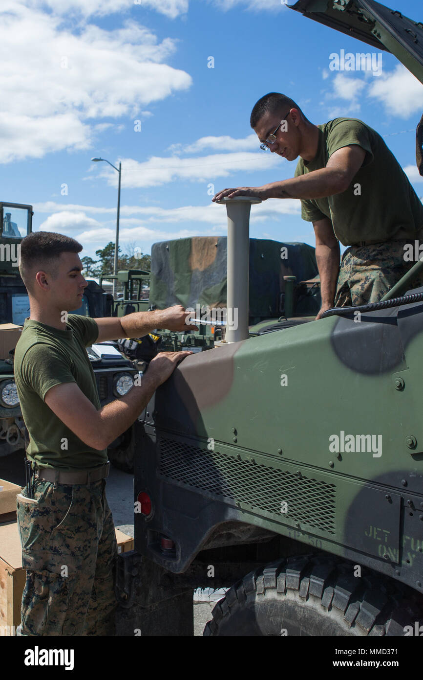 U.S. Marine Corps Pfc. Isaiah W. Rose, left, and Pfc. Carlos J. Deleon ...