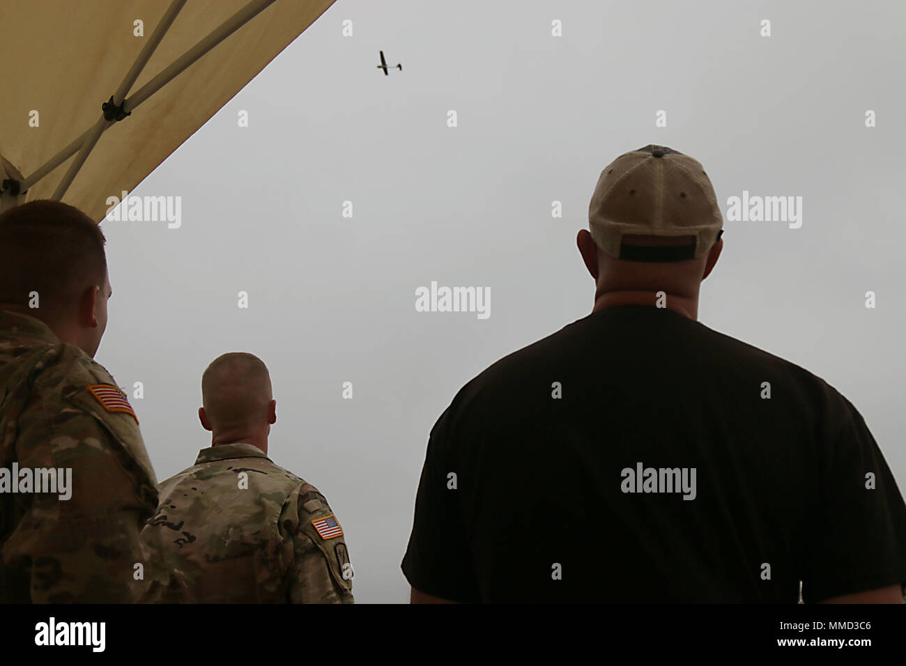 Bill Williams, training manager for Momentum Aviation Group, right ...