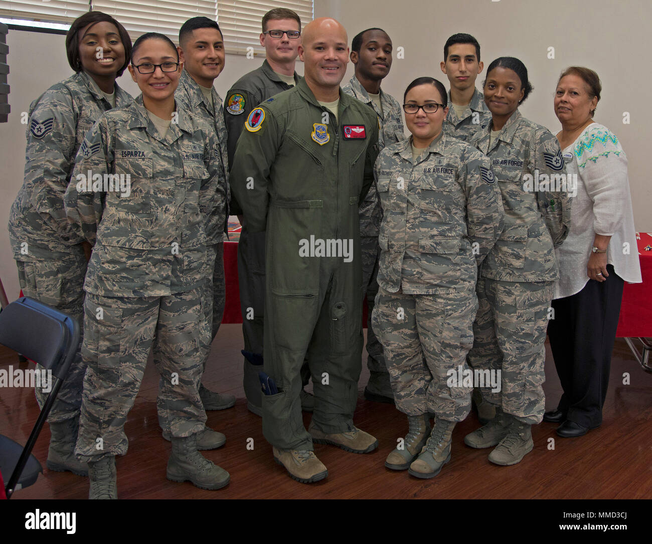 U.S. Air Force Airmen pause for a photo with guest speakers, Lt. Col ...