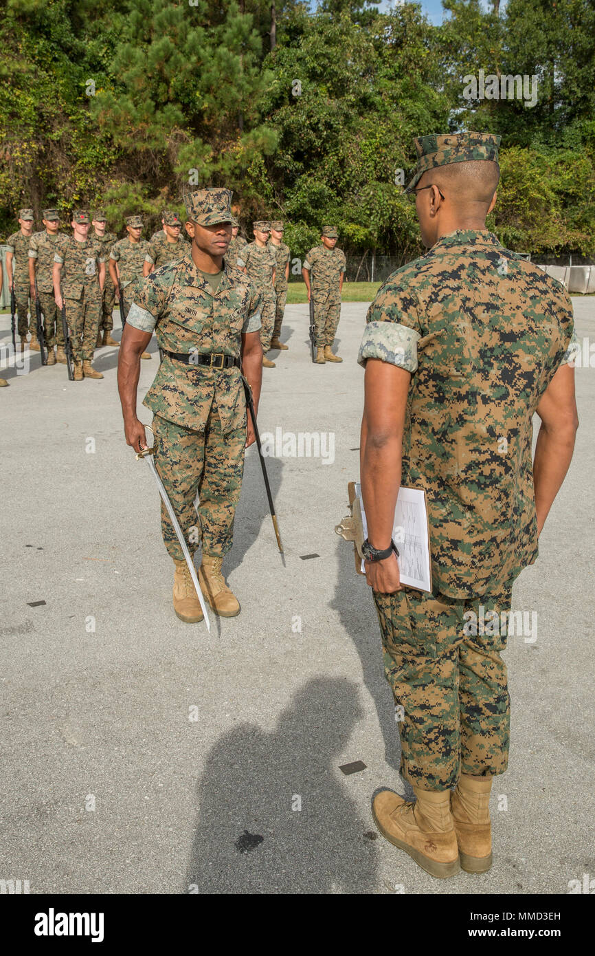 U.S. Marine Corps Staff Sgt. Jonah W. Smith Jr., left, Motor ...