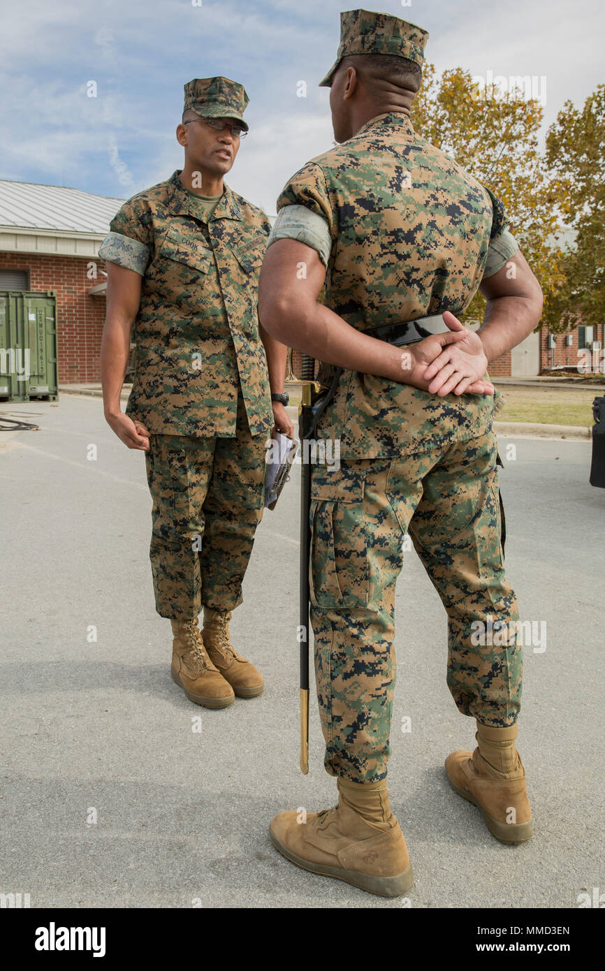 U.S. Marine Corps Sgt. Maj. Jamal R. Cook, left, sergeant major of ...