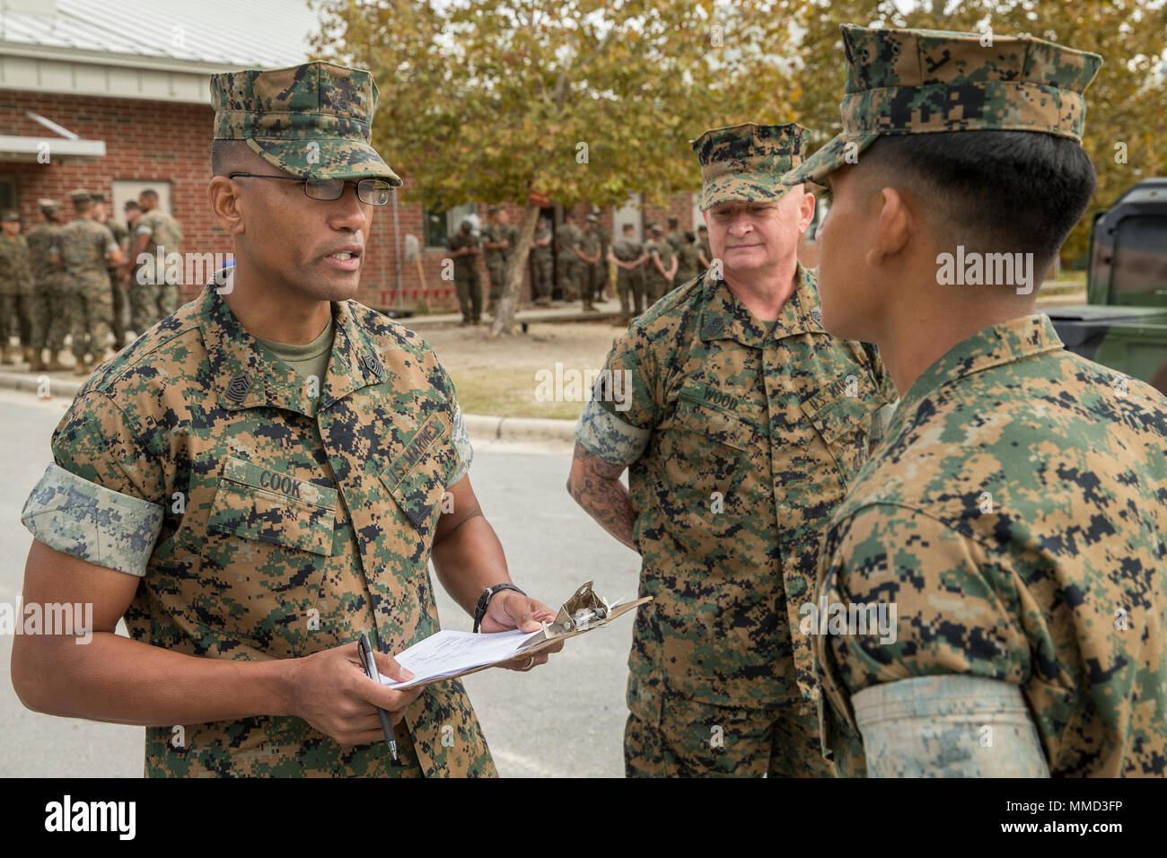 U.S. Marine Corps Sgt. Maj. Jamal R. Cook, left, sergeant major of ...