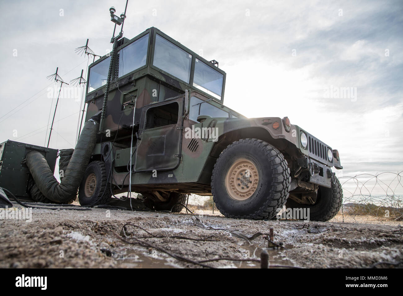 A MSN-7 mobile air traffic control tower is deployed from a Humvee ...