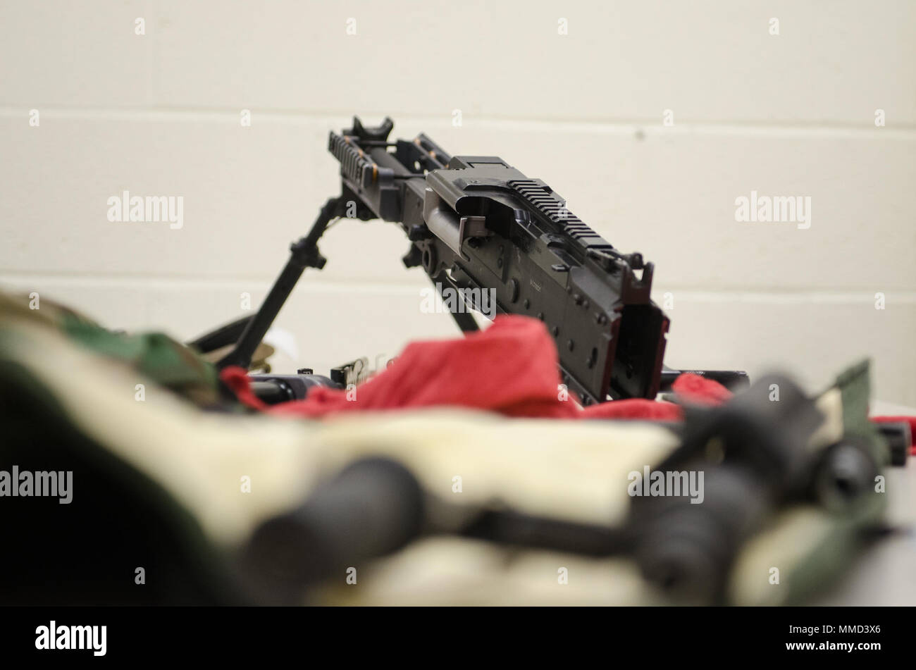 A disassembled crew-served weapon is prepared for cleaning at Operation ...