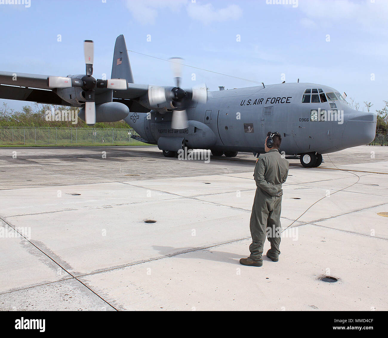 Airman 1st Class Edwin Ocasio observes engine start-up prior to a C-130 ...