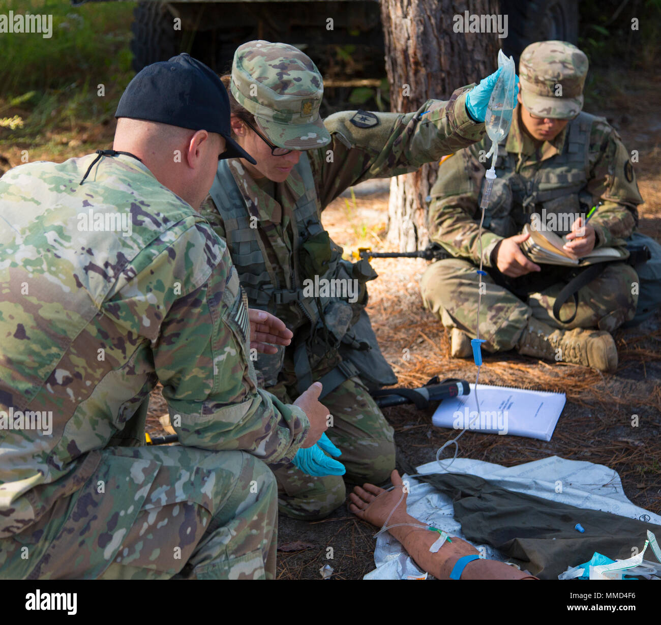 U.S. Army Soldier preforms simulated casualty field care during the ...
