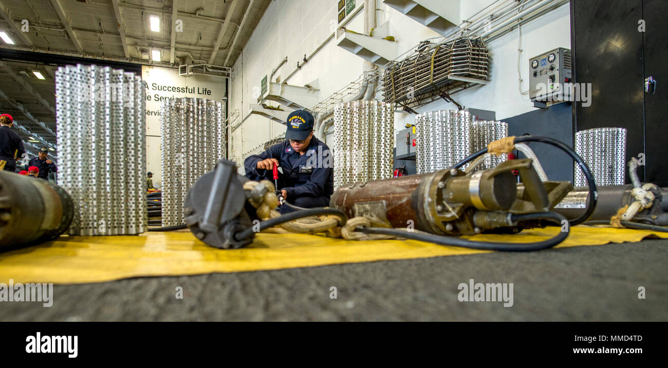 171010-N-NG136-067 NORFOLK (Oct. 10, 2017) Electrician's Mate 2nd Class ...