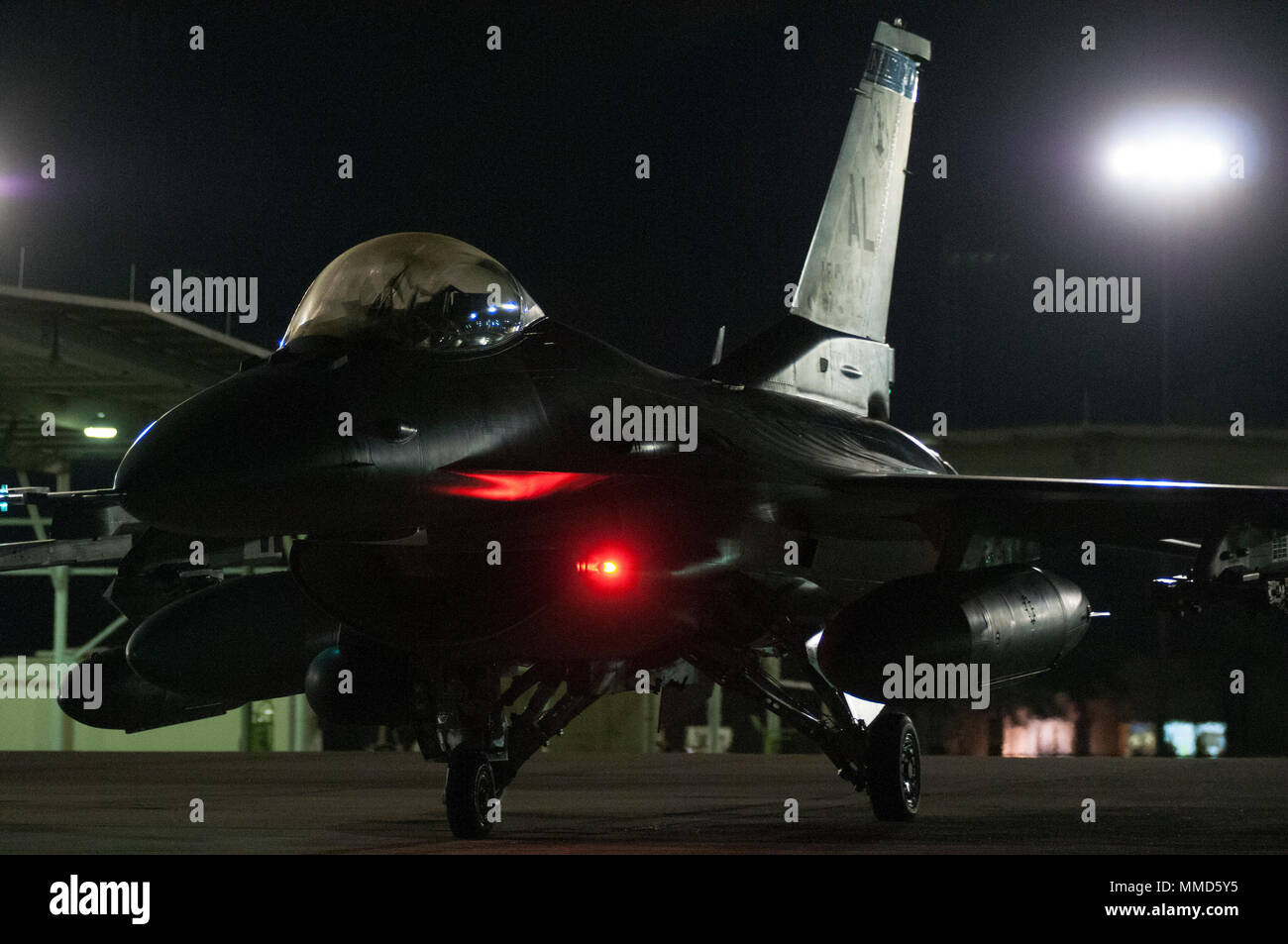 An F-16 Fighting Falcon aircraft from the 100th Fighter Squadron ...
