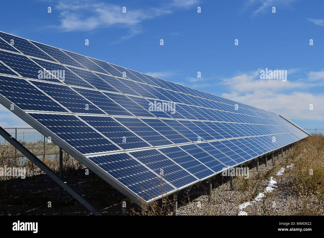 A solar array farm, located near the flight line, produces close to 10 ...