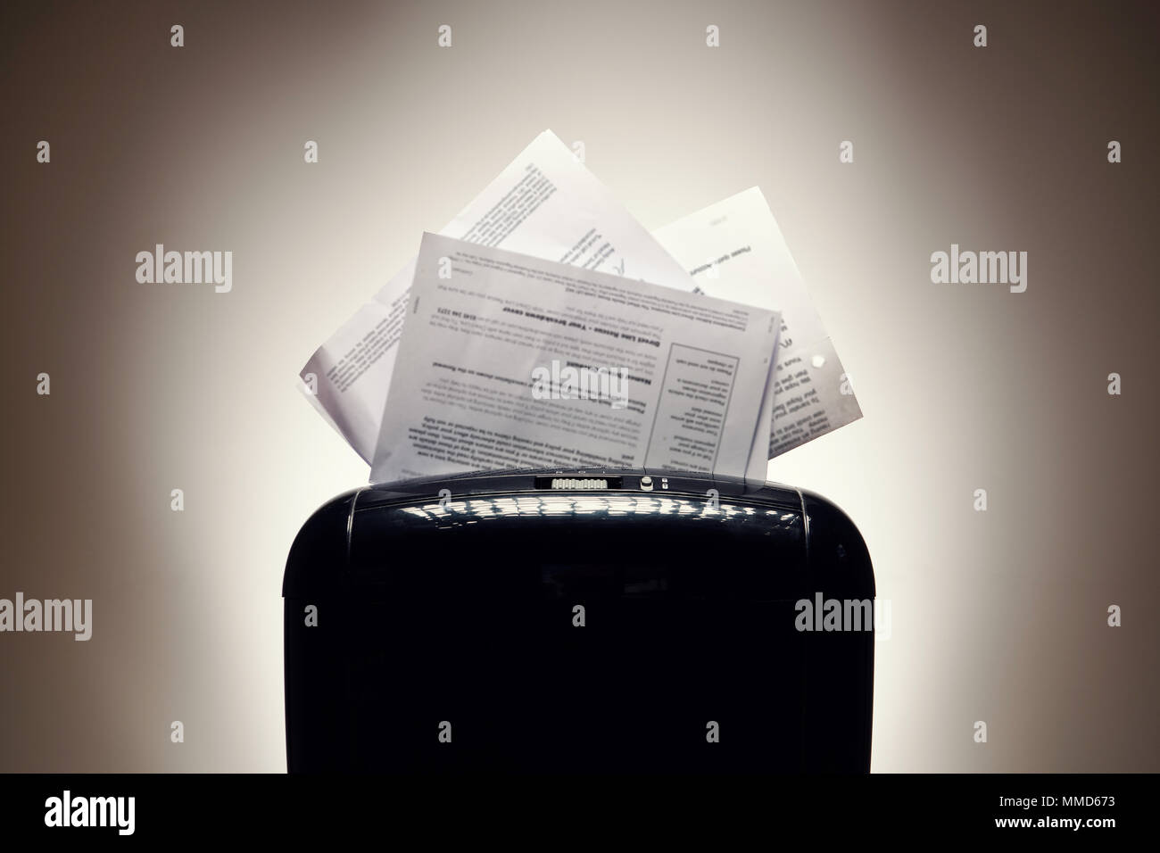 Office shredder and personal documents being shredded Stock Photo - Alamy