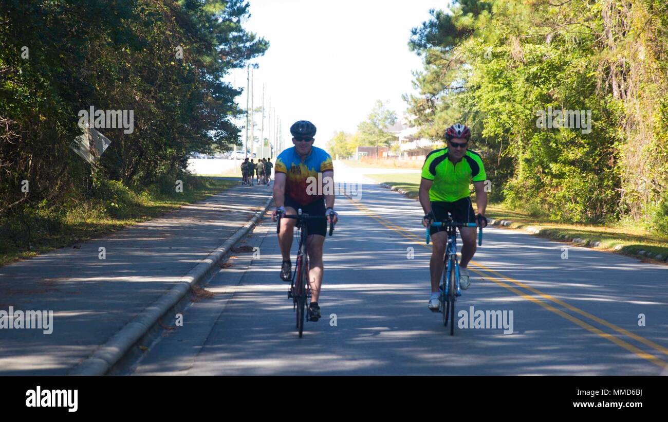 Marines ride their bikes during 2nd Marine Logistics Group’s unit bike ...