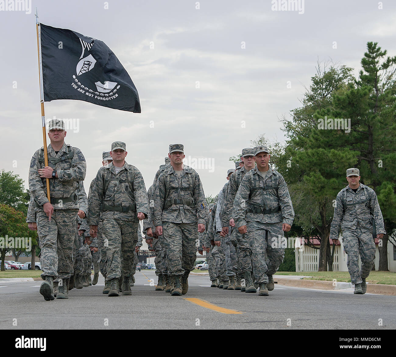 Vance Airmen march in formation during a 5 Kilometer ruck march around ...